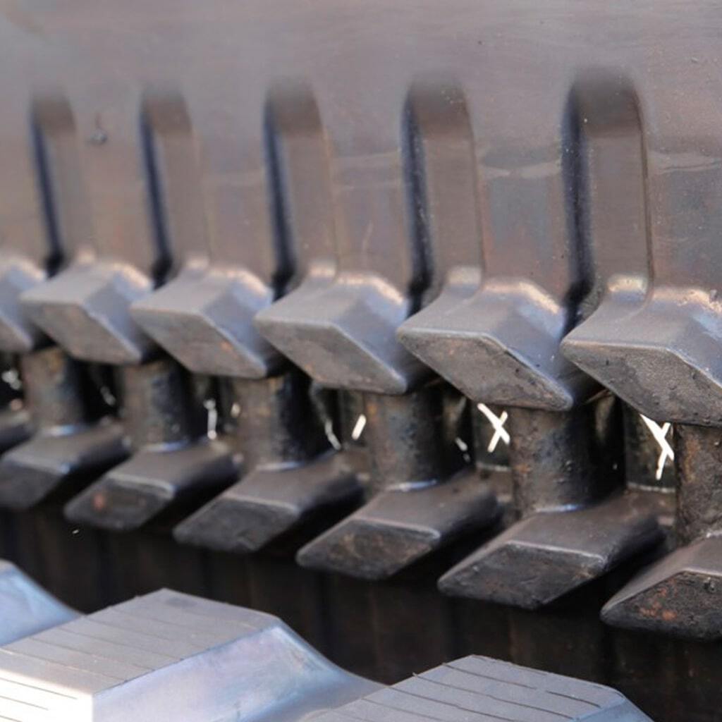 The difference between long pitch and short pitch rubber tracks